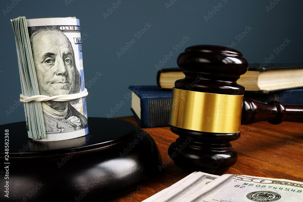 Foto de Bail bonds and fine concept. Money and gavel as symbol of law ...