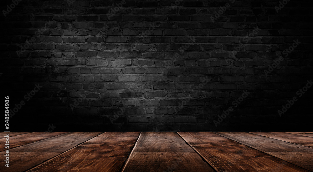 background of an empty black room, a cellar, lit by a searchlight ...
