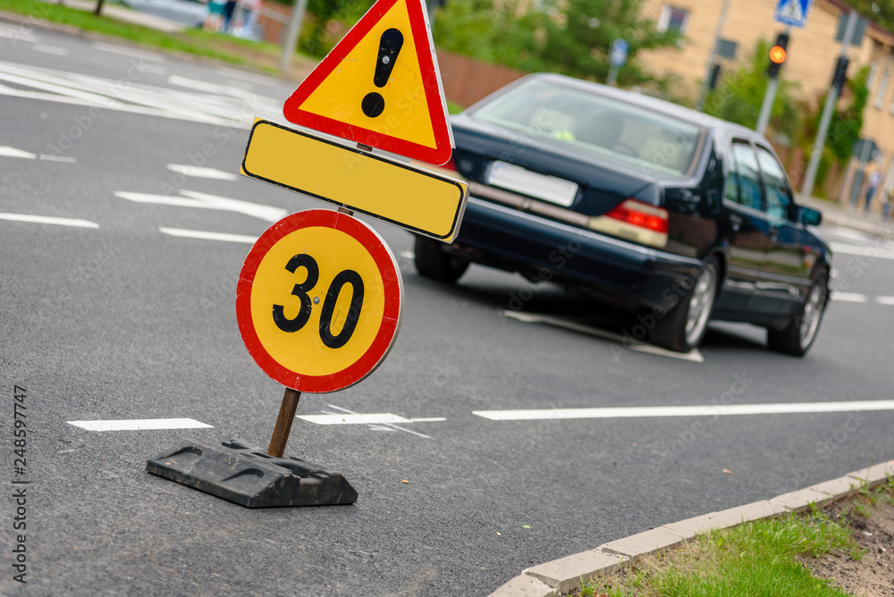 Road sign for 30 speed limit and danger traffic sign Stock Photo ...
