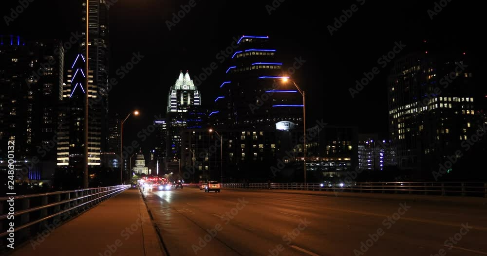 Austin Texas late night traffic scooters on bridge capital. Ann W ...