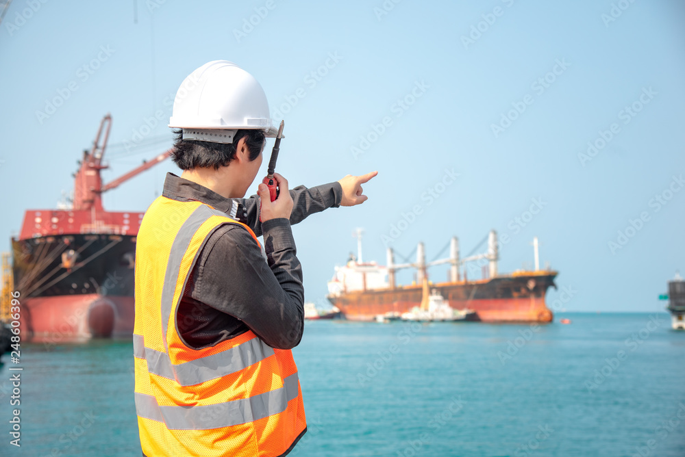 harbor master port control in command the ship to takes berthing to ...