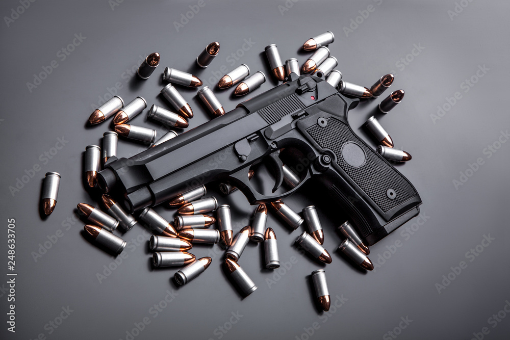 black modern gun on black background. 9mm pistol gun Stock Photo ...