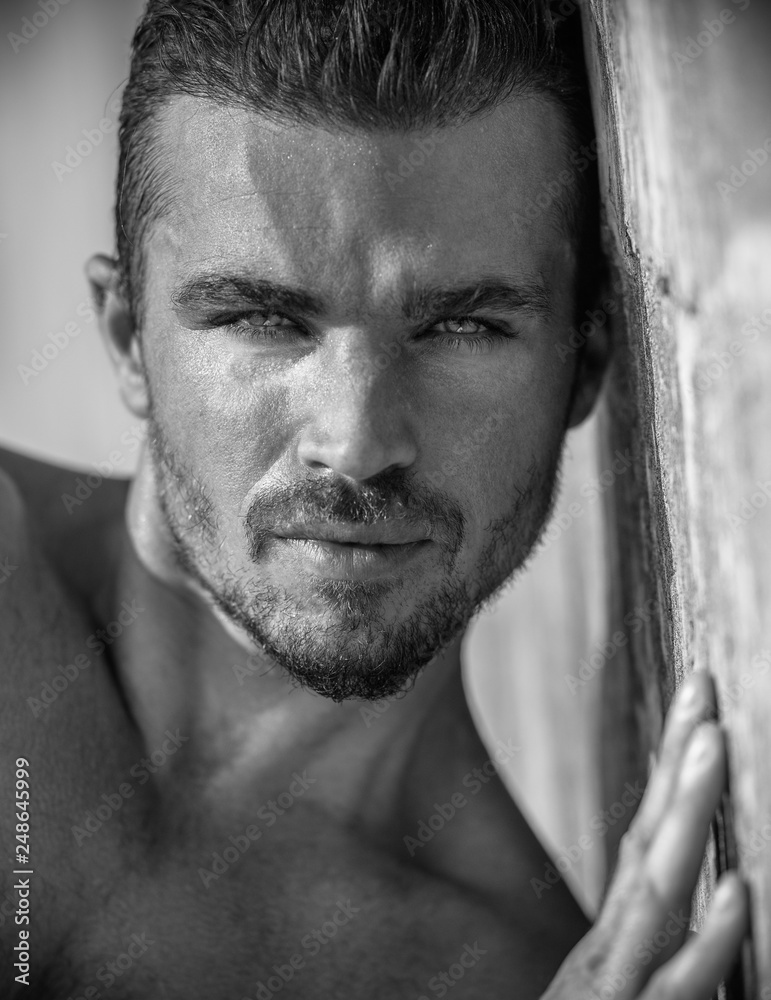 Vertical portrait of a handsome caucasian male model posing on the ...