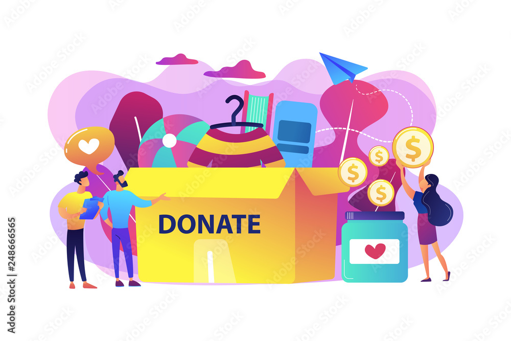 Volunteers collecting goods for charity into huge donation box and ...