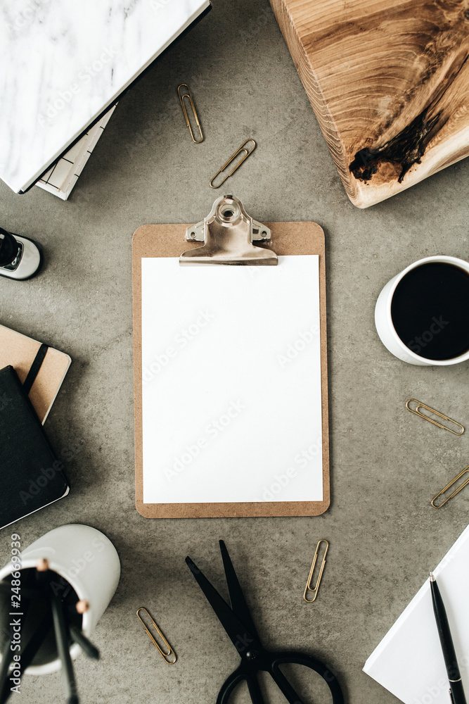 Flat lay of clipboard with copy space blank mock up. Top view home ...