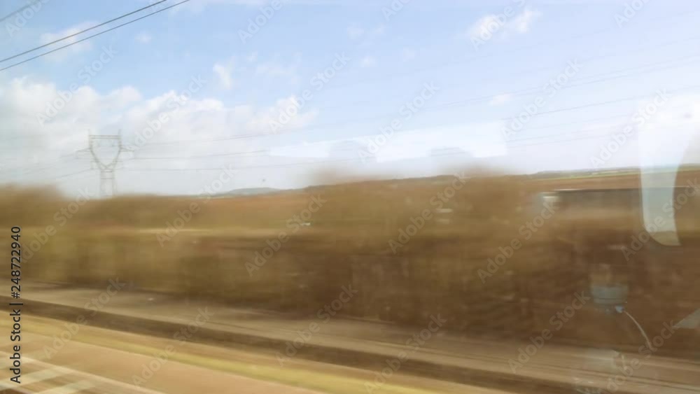 Wideo Stock: Cinematic view from the train window over the nearby ...