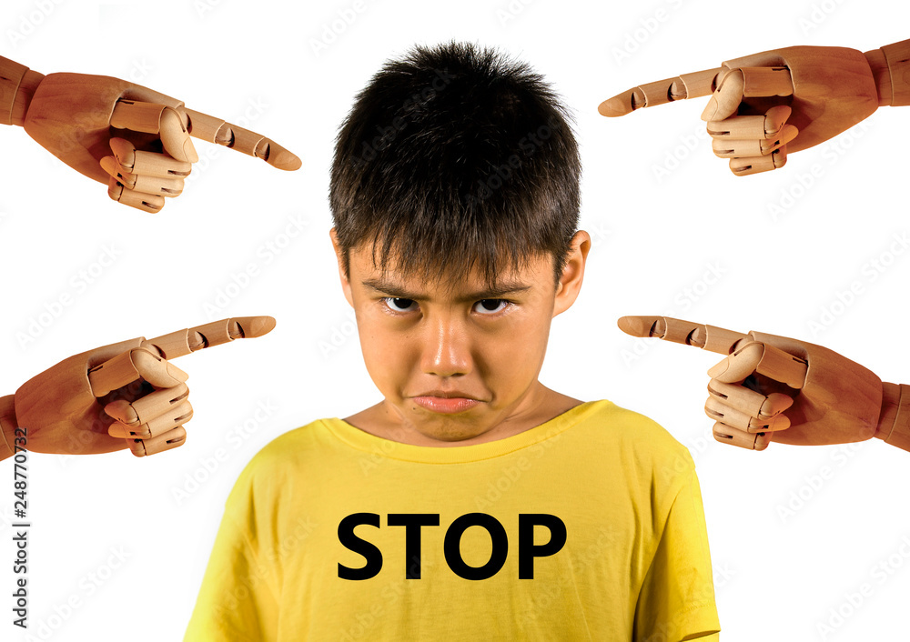 group of wood hands pointing finger to young sad and stressed schoolboy ...