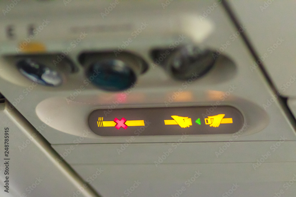 No Smoking and Fasten Seat belt Sign Inside an Airplane. Fasten seat ...