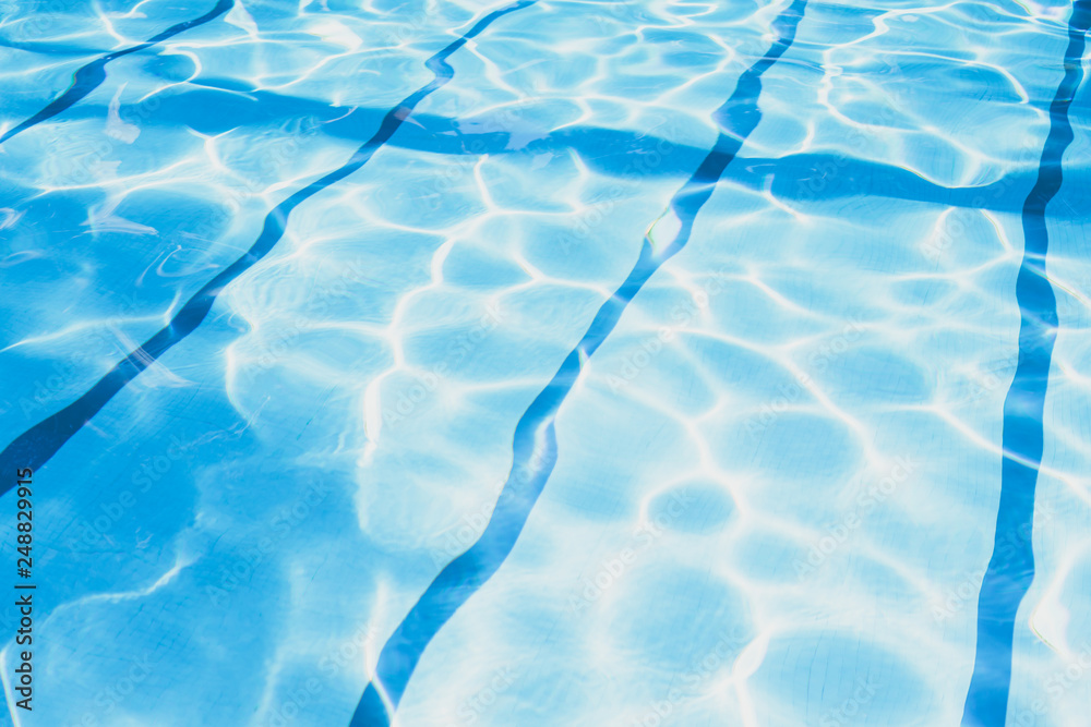 Summer day at swimming pool. Background and texture concept. Ripple ...