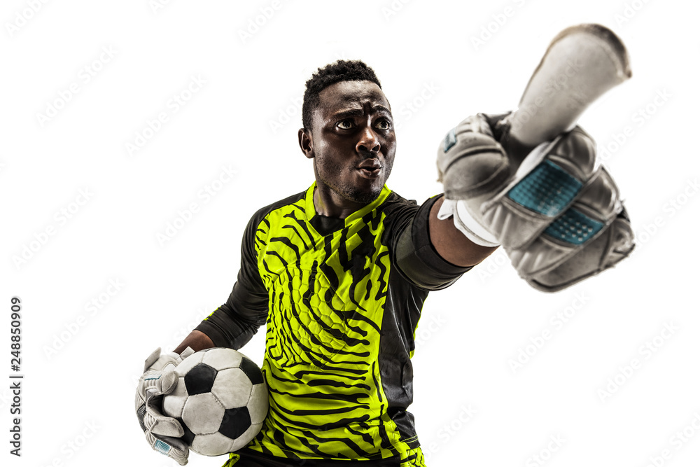 One african male soccer player goalkeeper pointing away and screaming ...