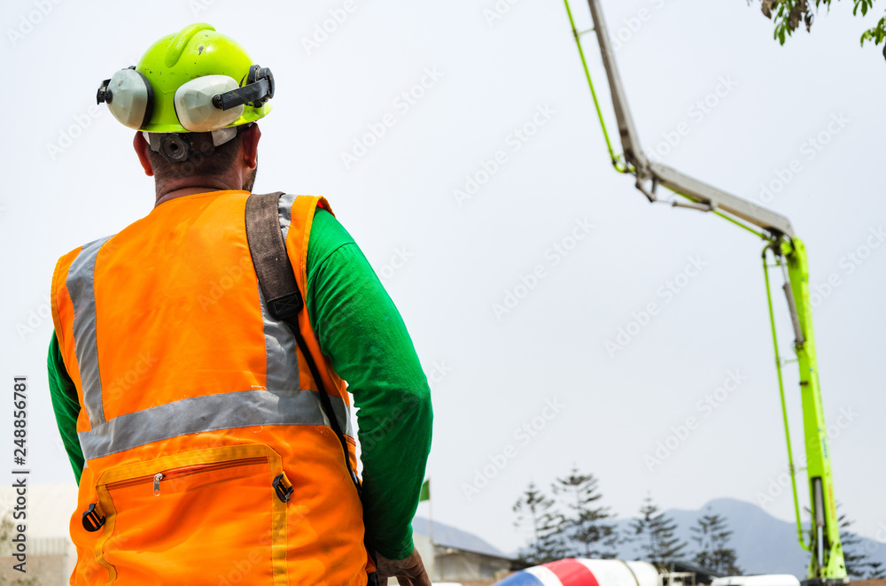 Concrete pump operator with remote control for boom pump truck at ...