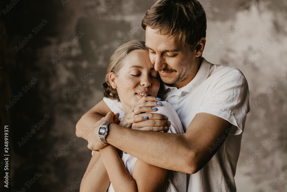 Beautiful loving couple are laughing and hugging Stock Photo | Adobe Stock