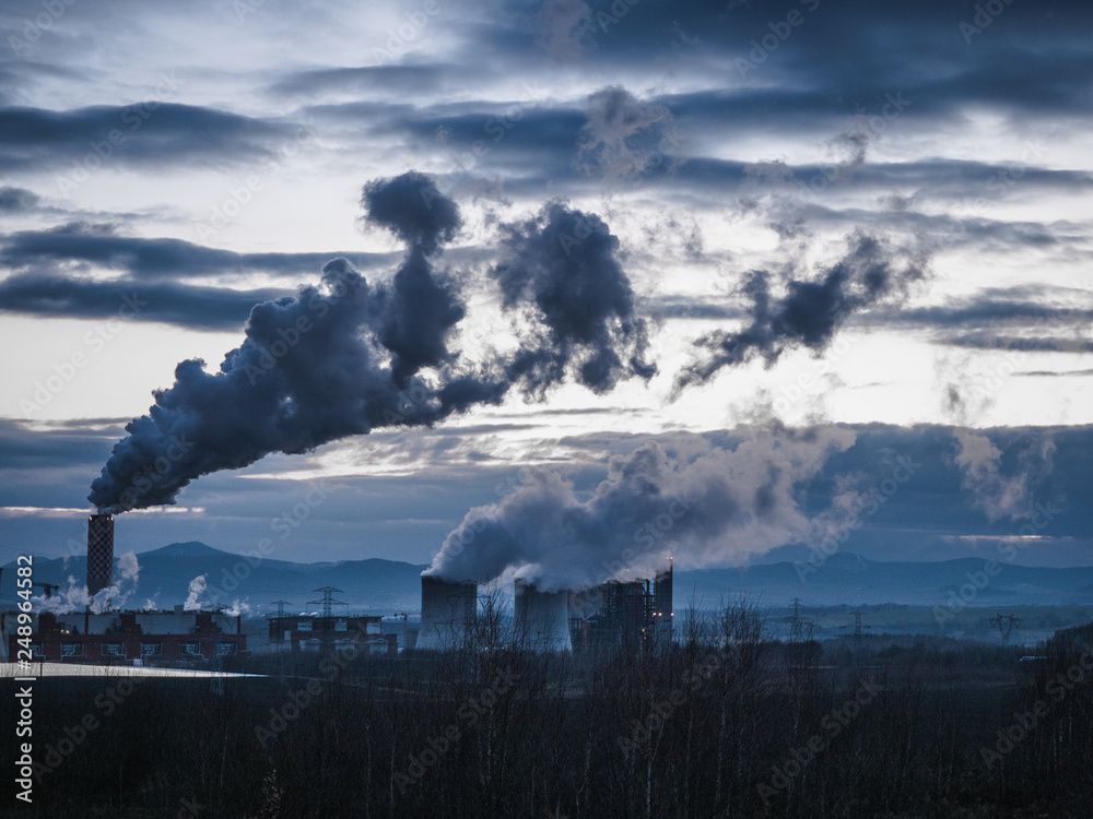 Smoke from the factory pipes. Ecological problem, mining enterprise ...