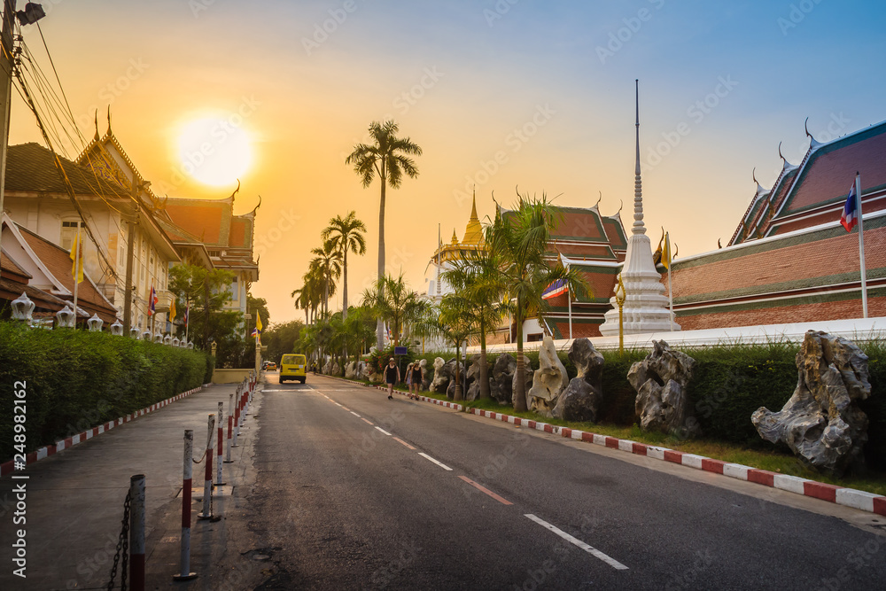 Beautiful sunset at Wat Saket Ratcha Wora Maha Wihan (Wat Phu Khao Thong, Golden Mount temple ...