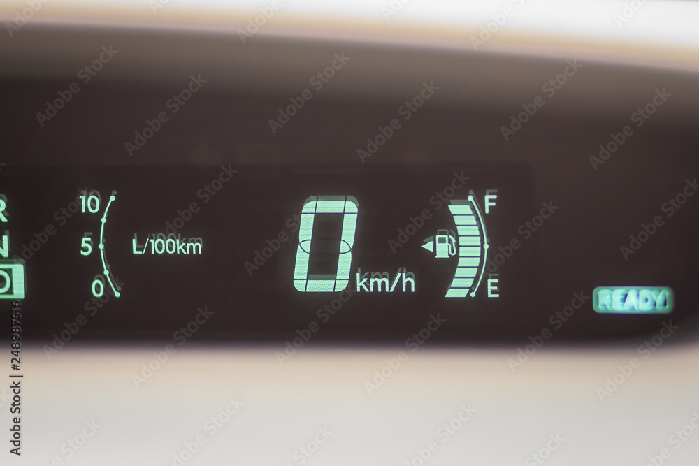 Modern digital mileage odometer and speed meter on dashboard when ...