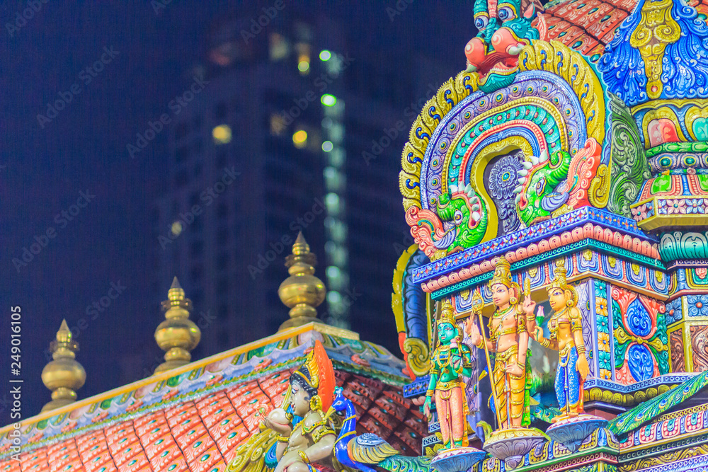 Colorful night view of indian gods sculpture at Sri Maha Mariamman ...