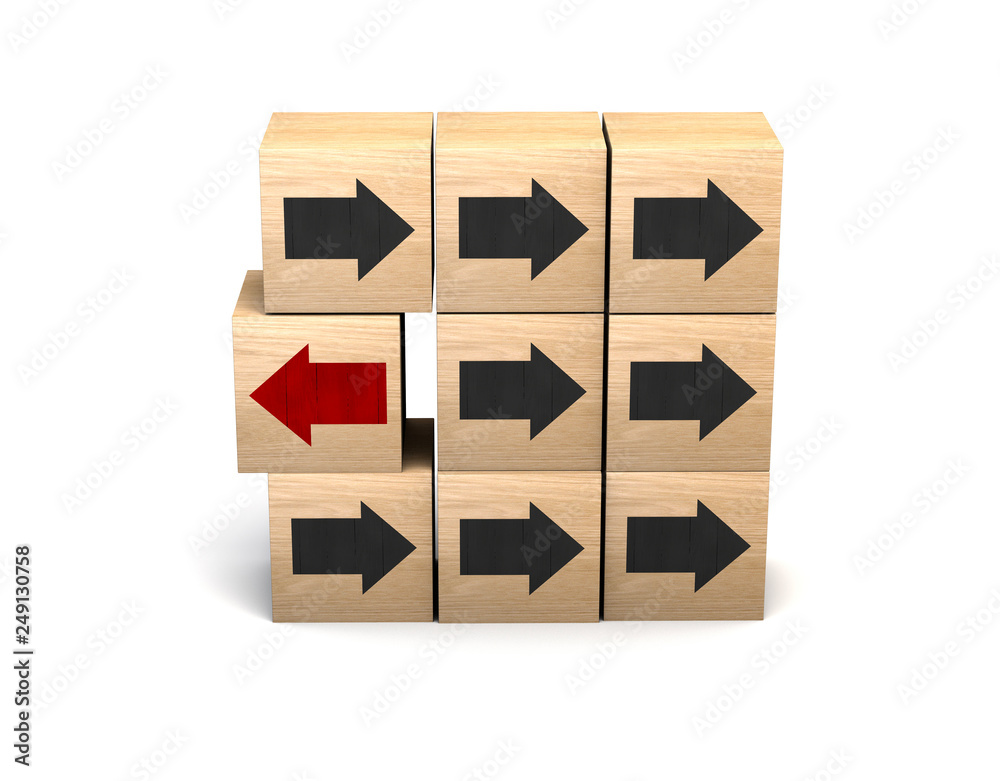 Wooden block with red arrow facing the opposite direction black arrows ...