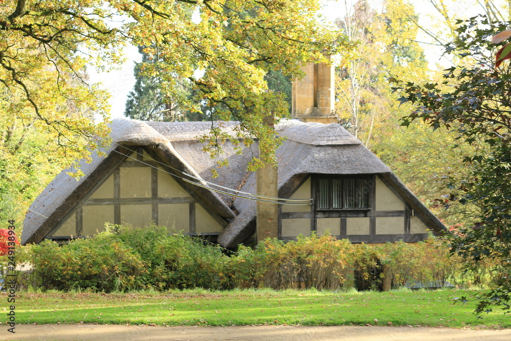 Old thatched cottage in the English countryside. An old thatched ...
