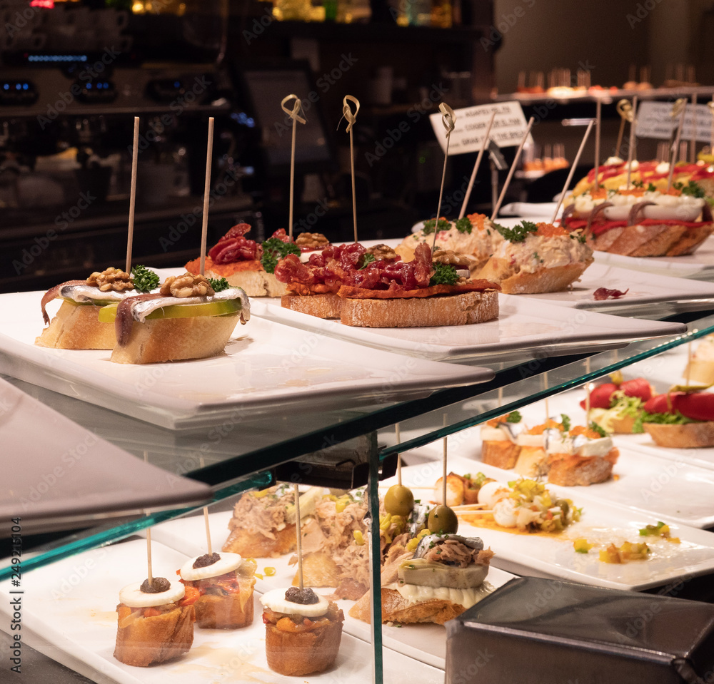 Showcase window display assortiment with tapas – traditional Spanish ...