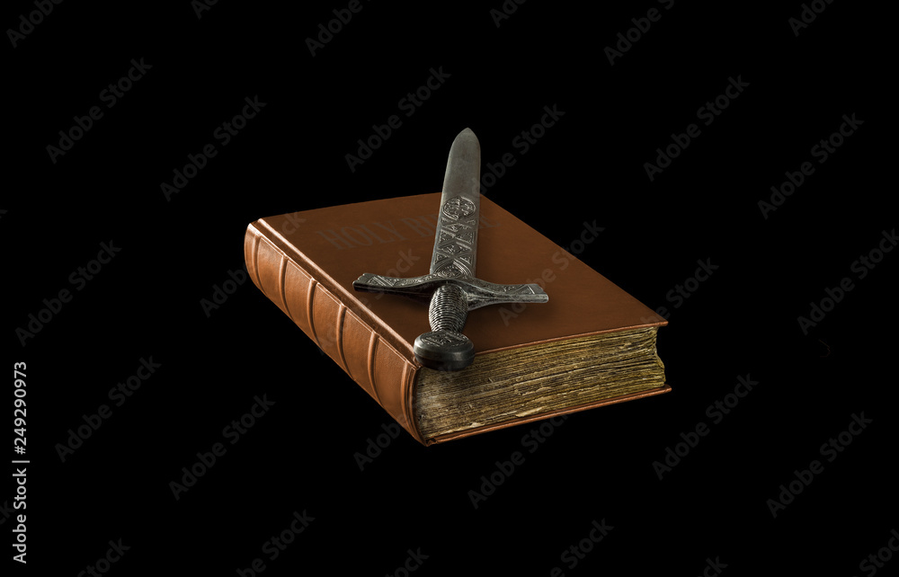 Sword on ancient book Stock Photo | Adobe Stock