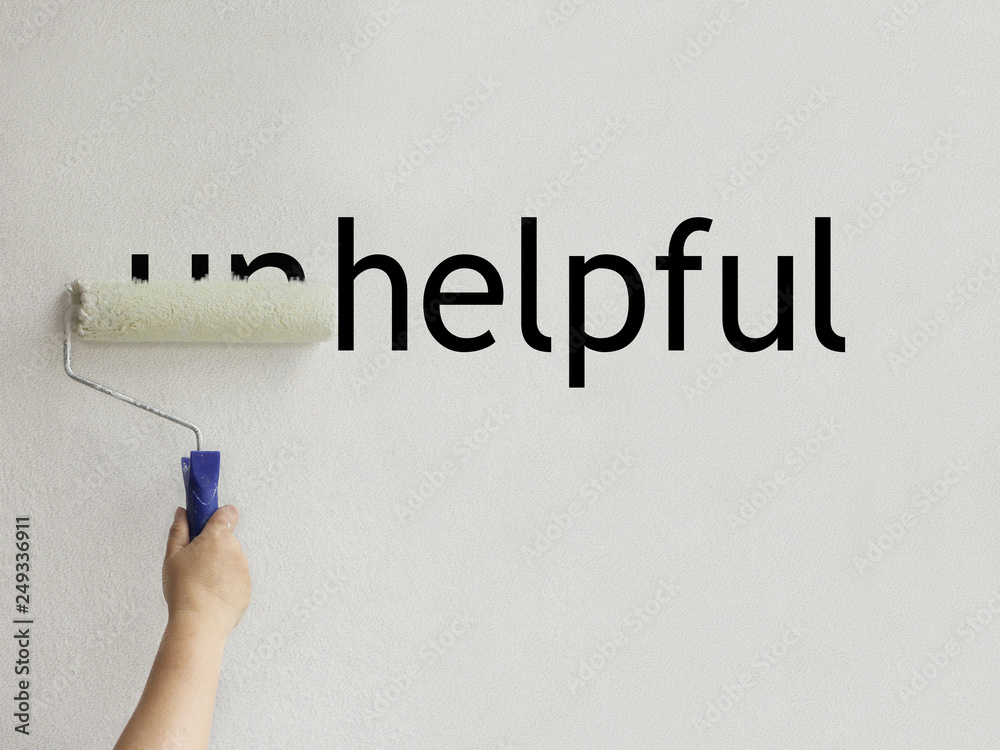 the word unhelpful is filled with white paint and becomes helpful Stock ...