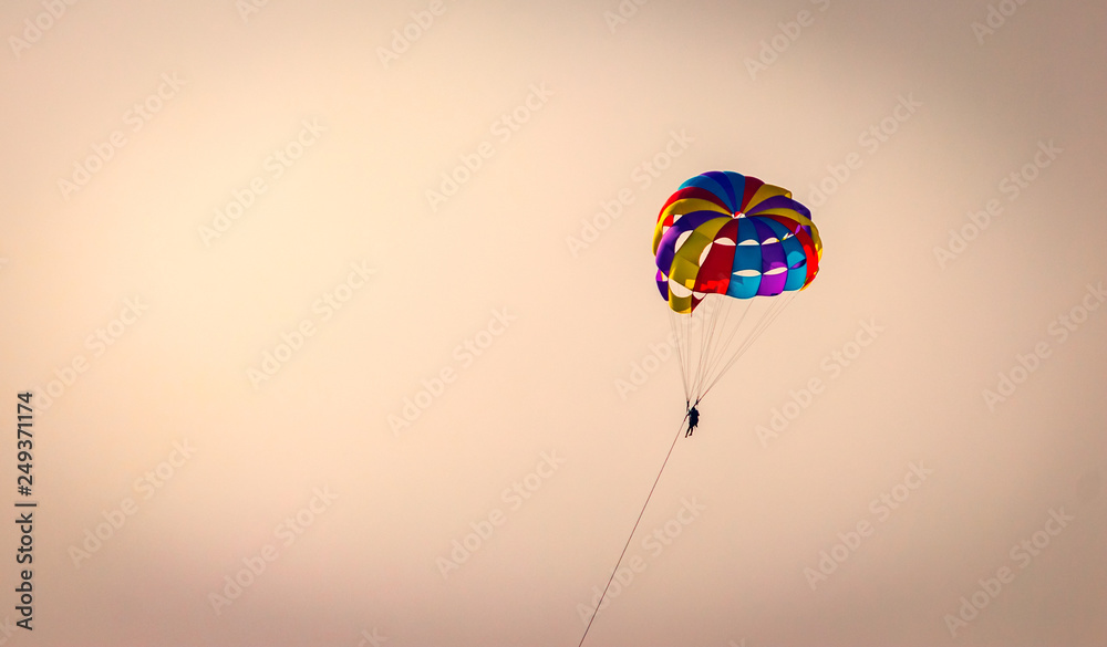 Parasailing on Baga Beach, Goa in summer. person under parachute ...