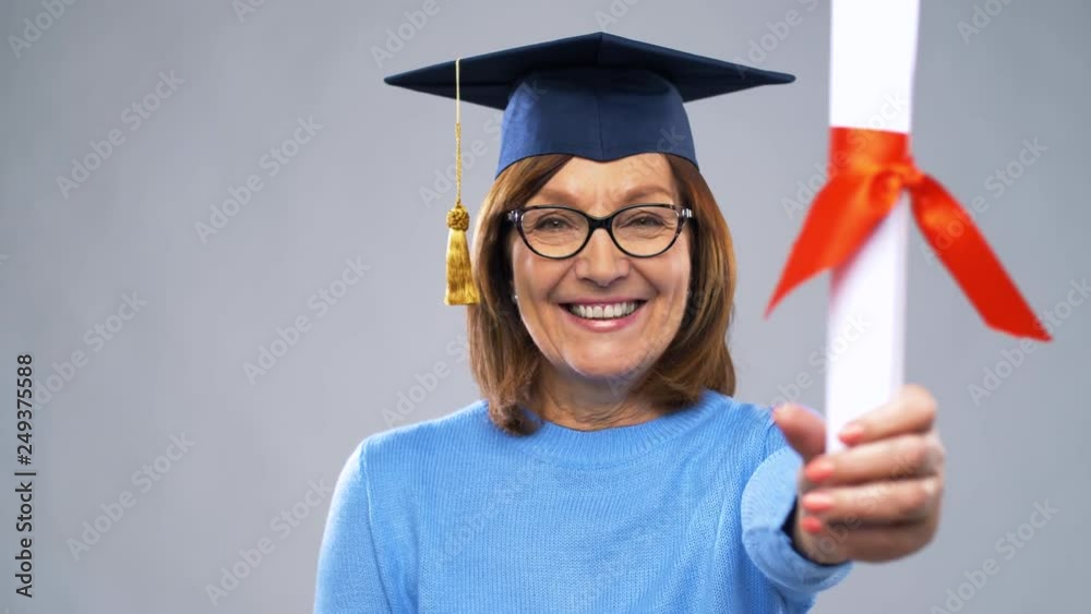 graduation, education and old people concept - happy senior graduate ...