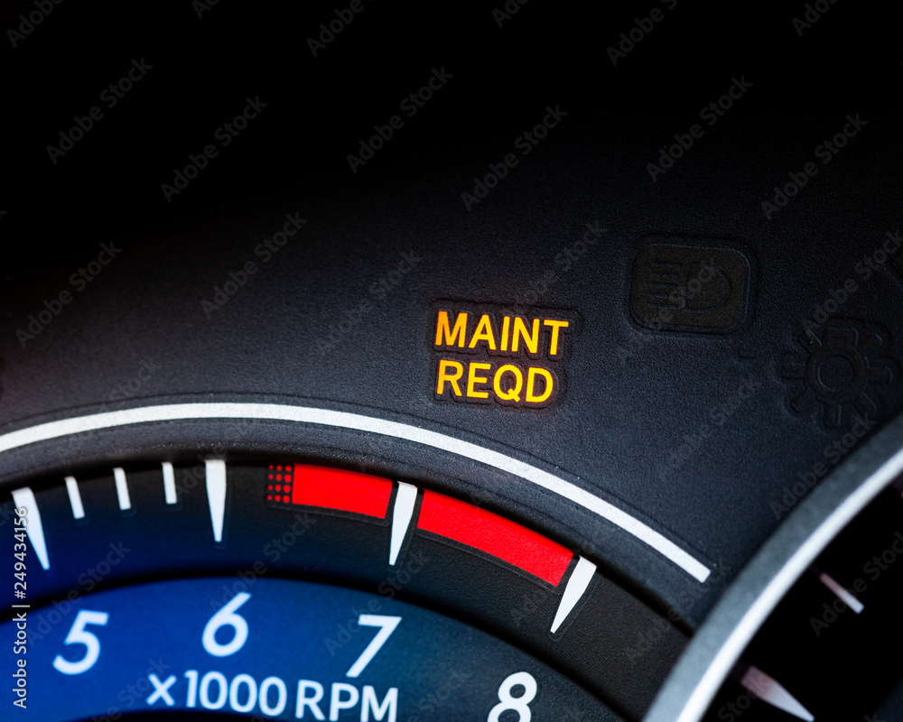 Engine maintenance or service light is on in car dashboard. Car ...