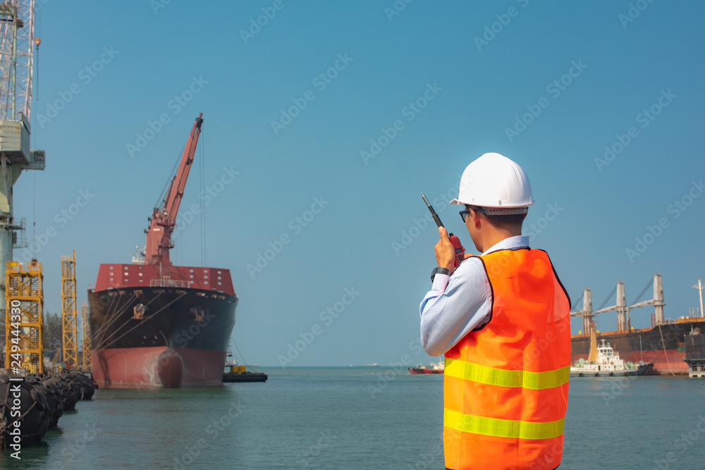 harbor master port control in command the ship to takes berthing to ...