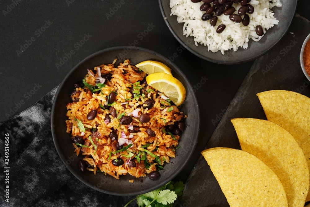 Rice and beans Taco shells on side / Mexican meal overhead view Stock ...