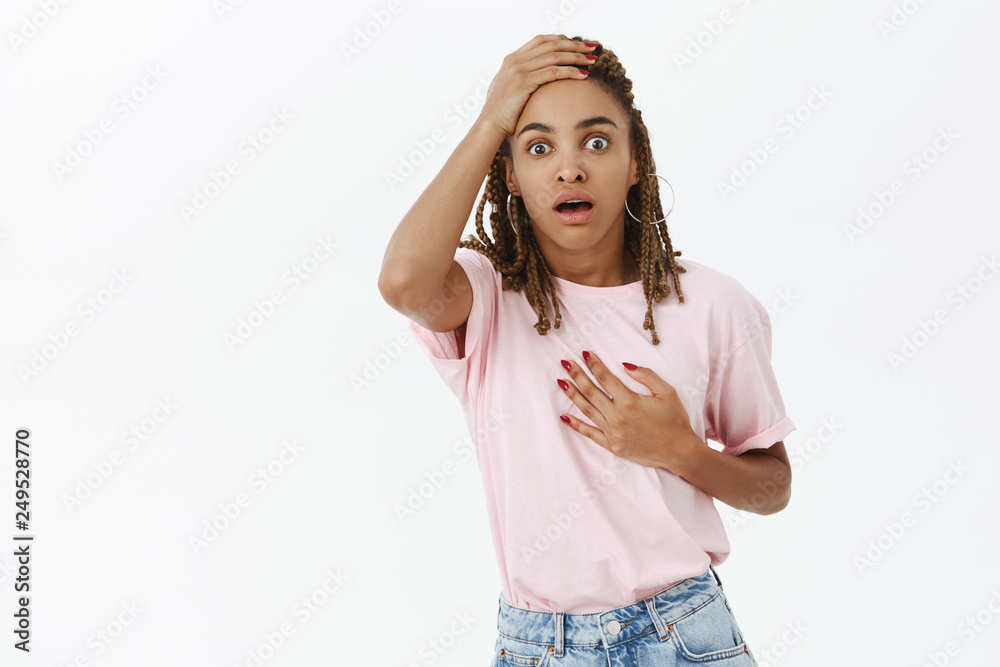 You scared me to death. Portrait of shocked speechless cute dark ...