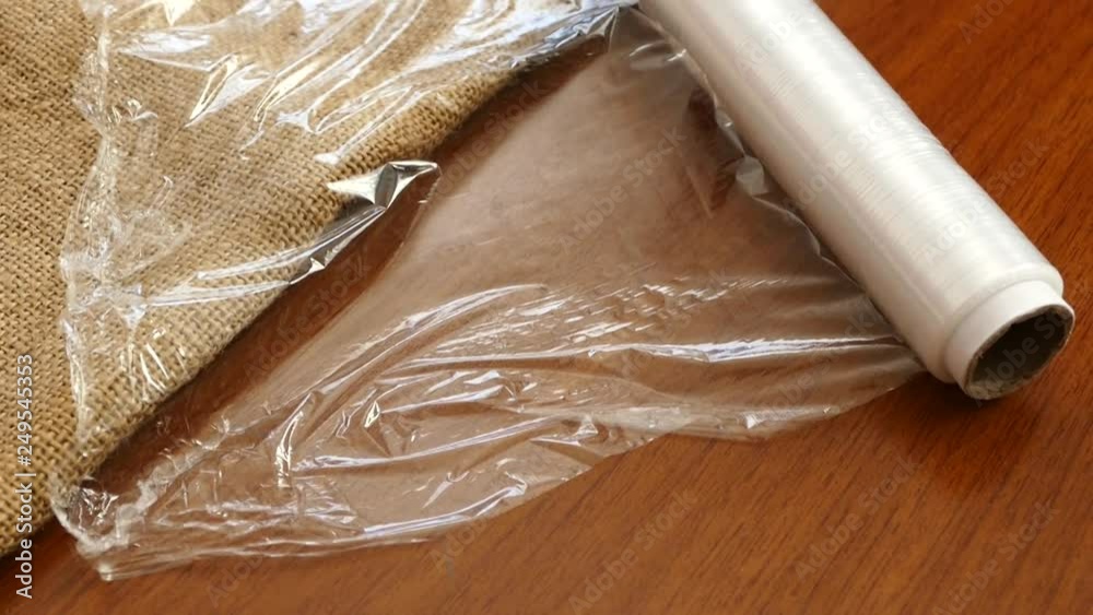 wooden floor and a roll stretch film, Stretch film for wrapping foods a ...