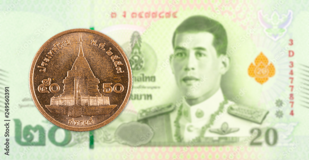 50 thai satang coin against 20 new thai baht banknote Stock Photo ...