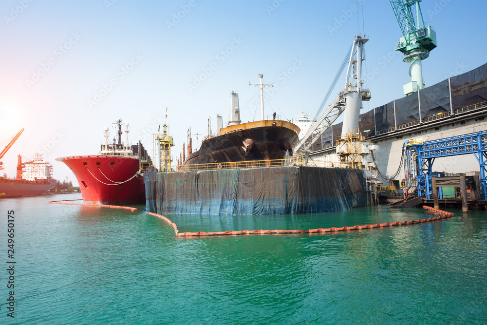ship berthing alongside in the dock yard terminal for repairing in ...