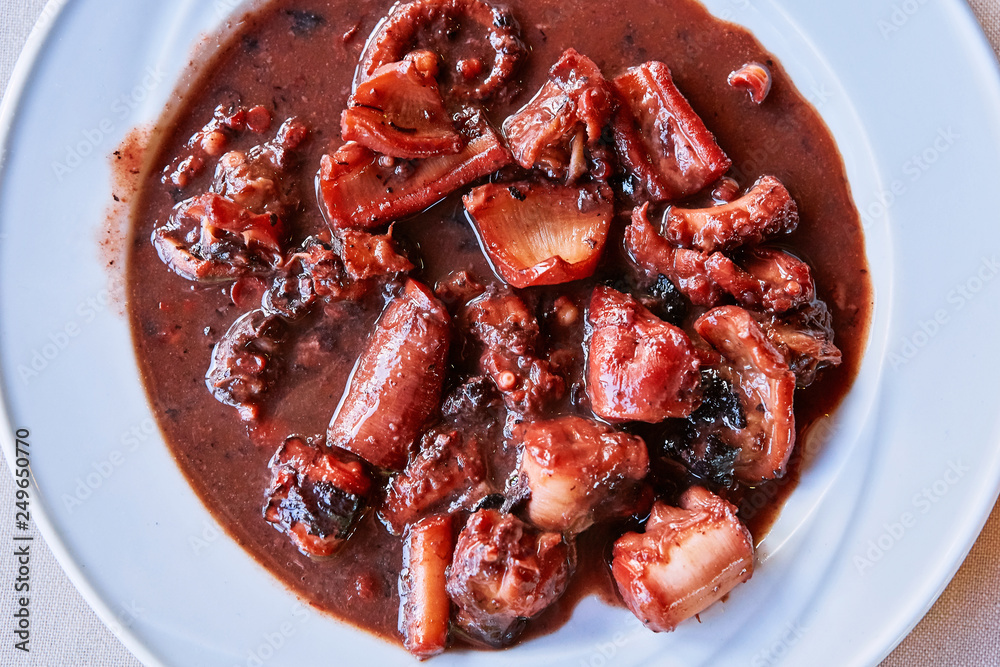 Octopus in a red wine sauce traditional greek cyprus Mediterranean food ...
