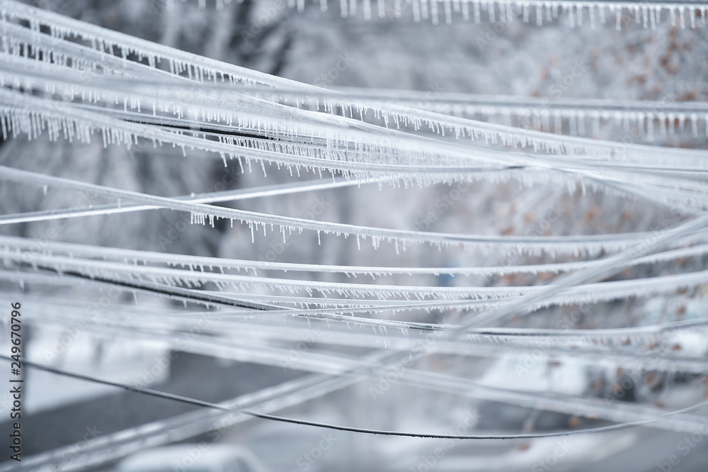 Electricity cables covered in ice after frozen rain phenomenon Stock ...