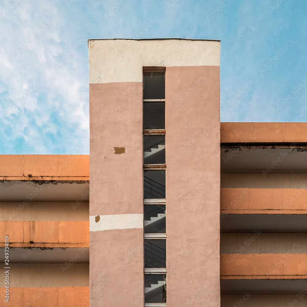 The wall of an old industrial building. Industrial background. A wall ...