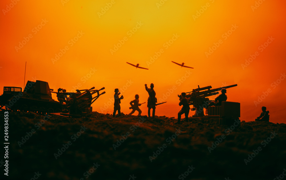 An anti-aircraft cannon and Military silhouettes fighting scene on war ...