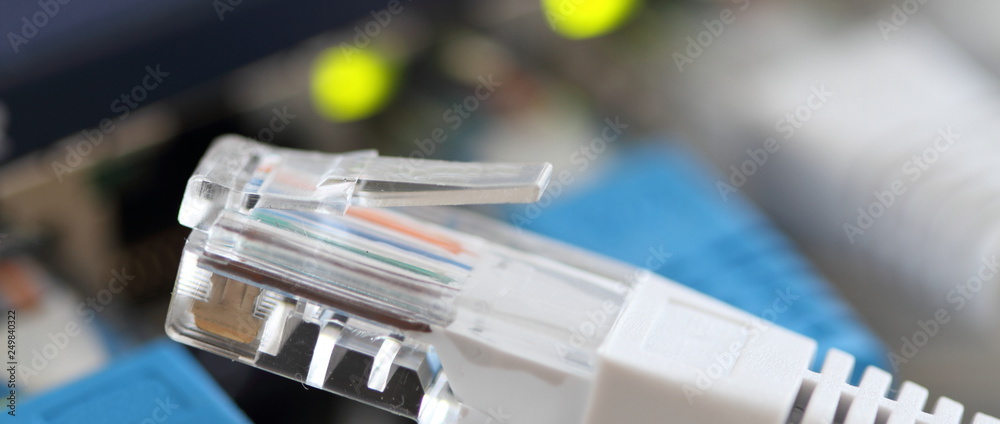 RJ45 Stecker in einem Router Stock Photo | Adobe Stock