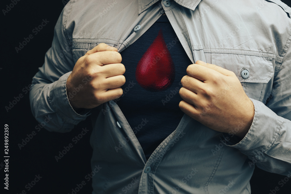 Business man in shirt with a picture red blood drop. World Blood Donor ...
