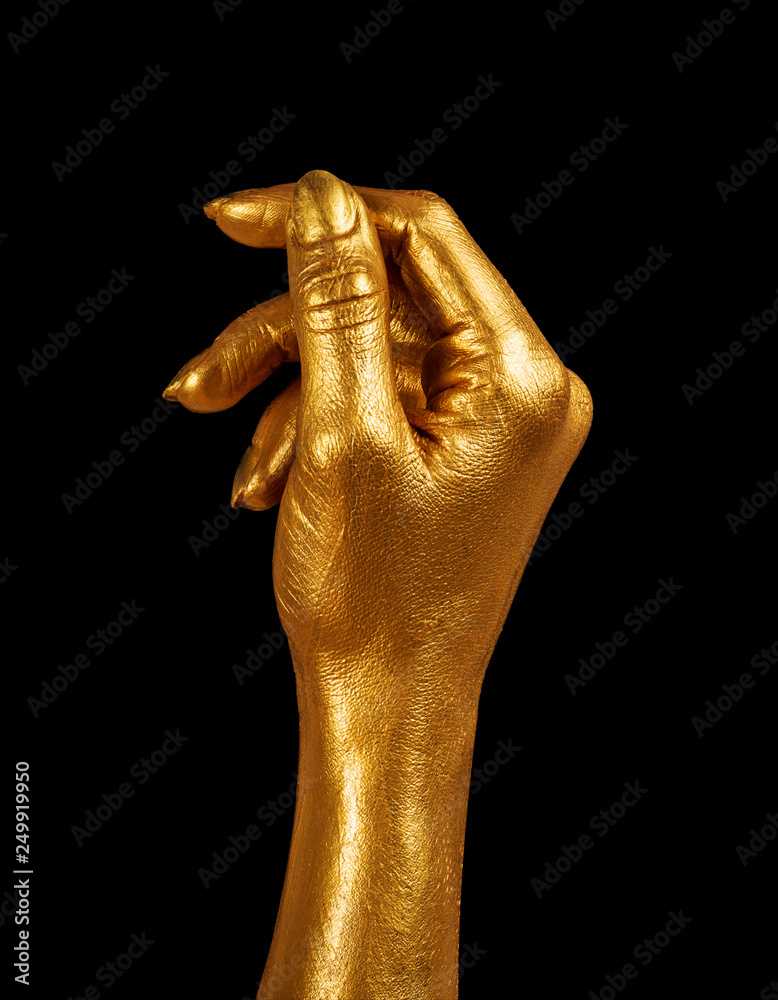 Hand gesture. Hand in gold paint, shiny, metallic. Isolated on black ...