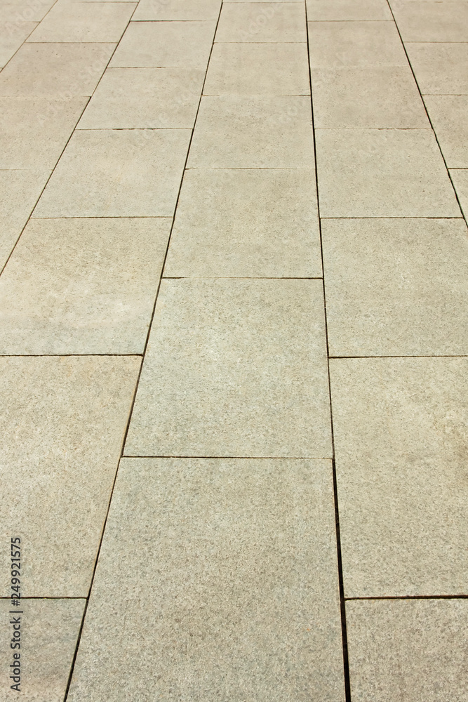 The surface of the pavement of large slabs. Pavement bricks. Pavement ...