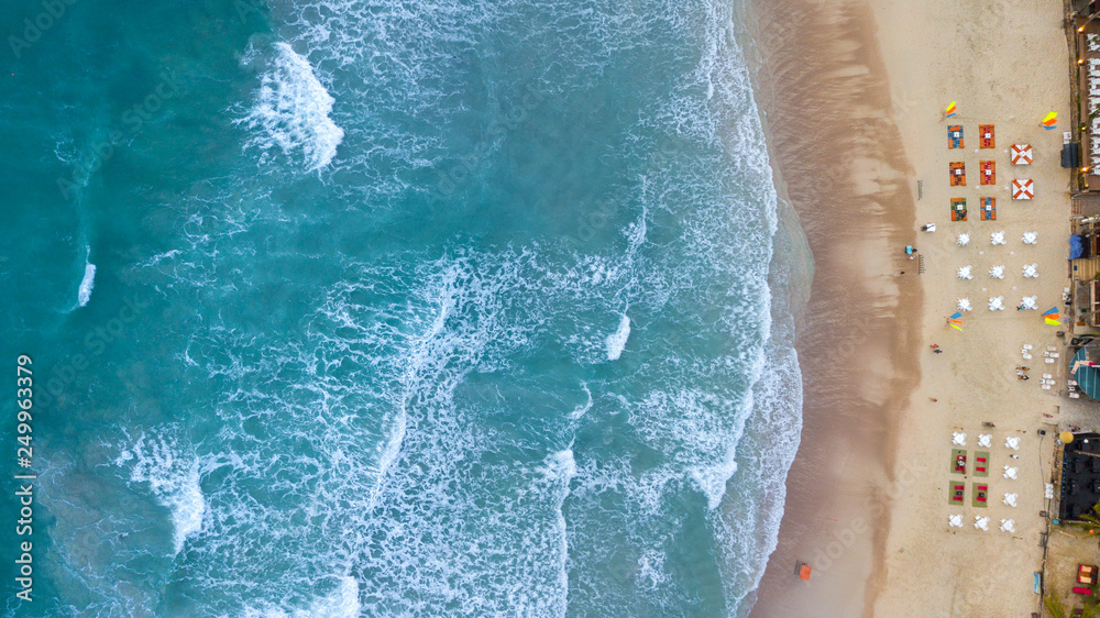 Aerial : Overhead of people enjoying the summer at sand beach resort ...