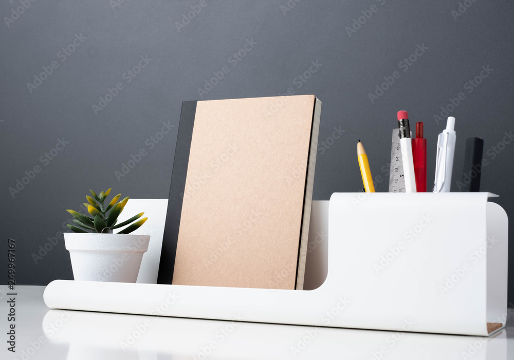 notebook on modern office stationery on white table.pencil, notepad ...