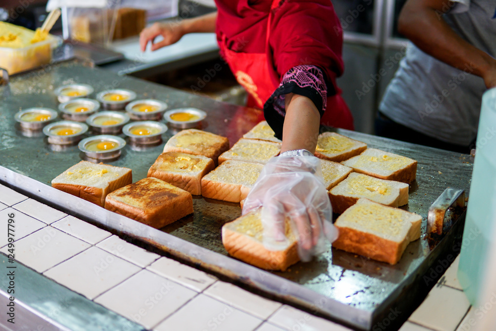 JOHOR, MALAYSIA - FEBRUARY 2019 : Workers preparing the "kacang pool ...
