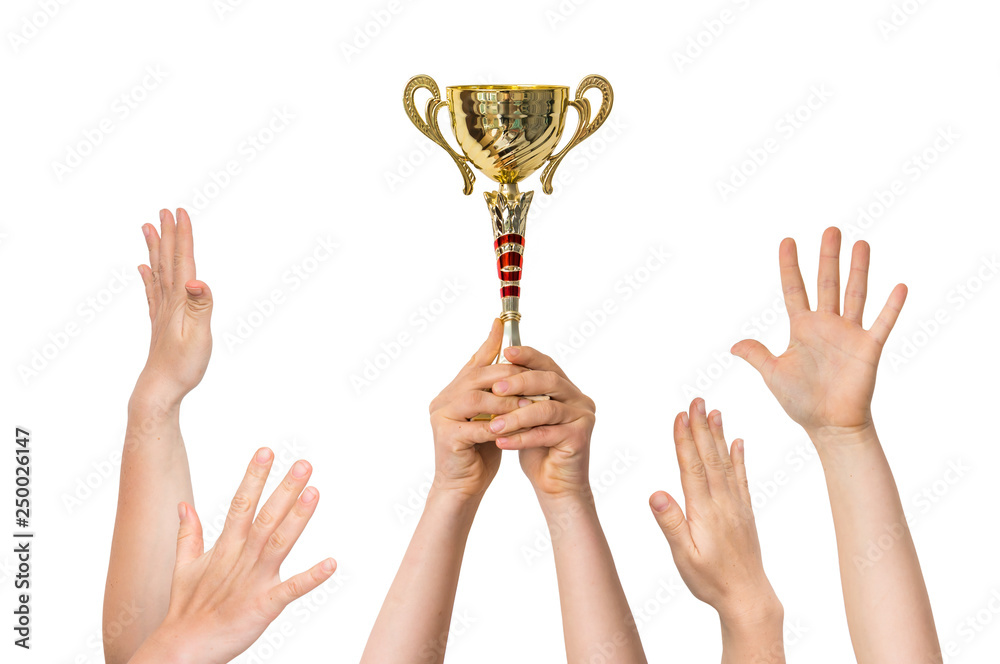 Winner is holding trophy in hands - many hands raised up Stock Photo ...