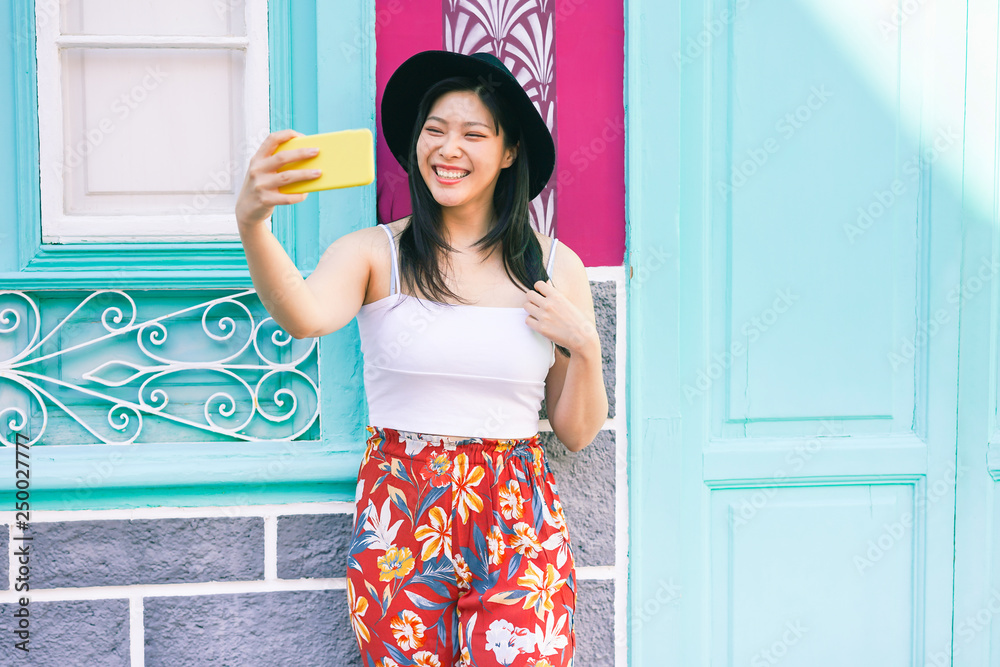 Asian social influencer woman making story for social network with ...