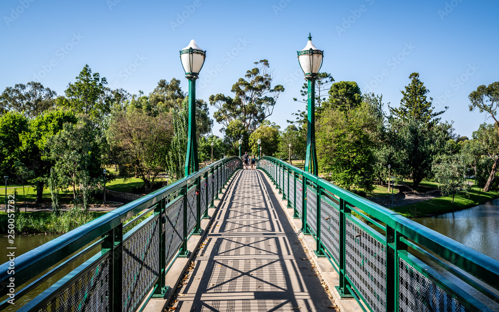 Old Albert bridge an heritage footbridge over Torrens River with street ...