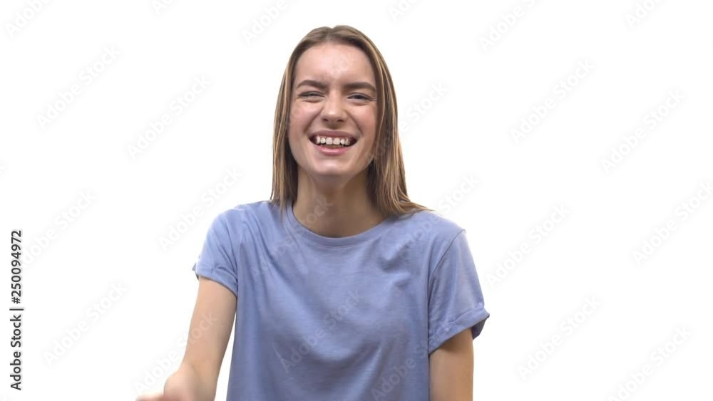 Slow motion gorgeous lively european female showing okay sign winking ...