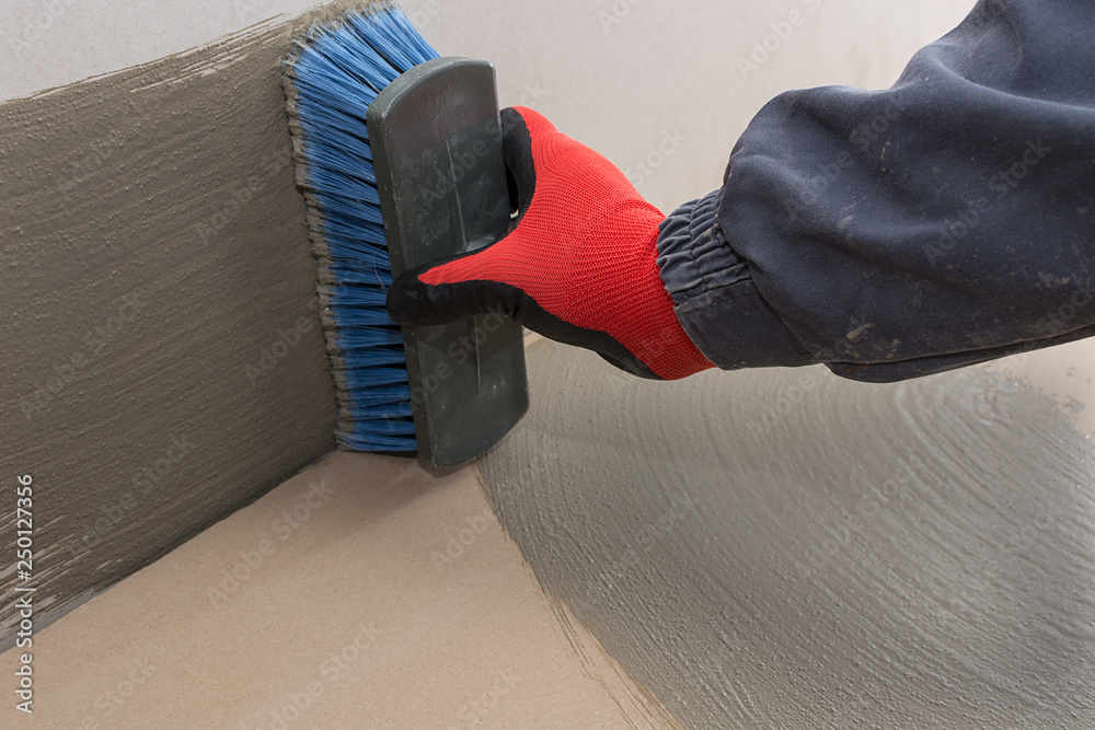application of a waterproofing coating on the wall, waterproofing layer ...